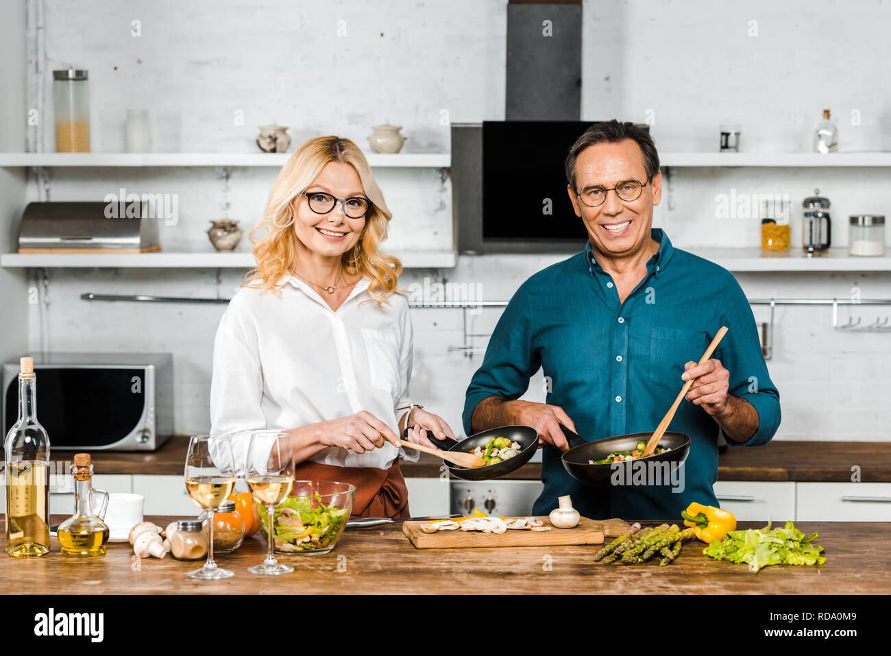 Husband cooking hi-res stock photography and images - Alamy