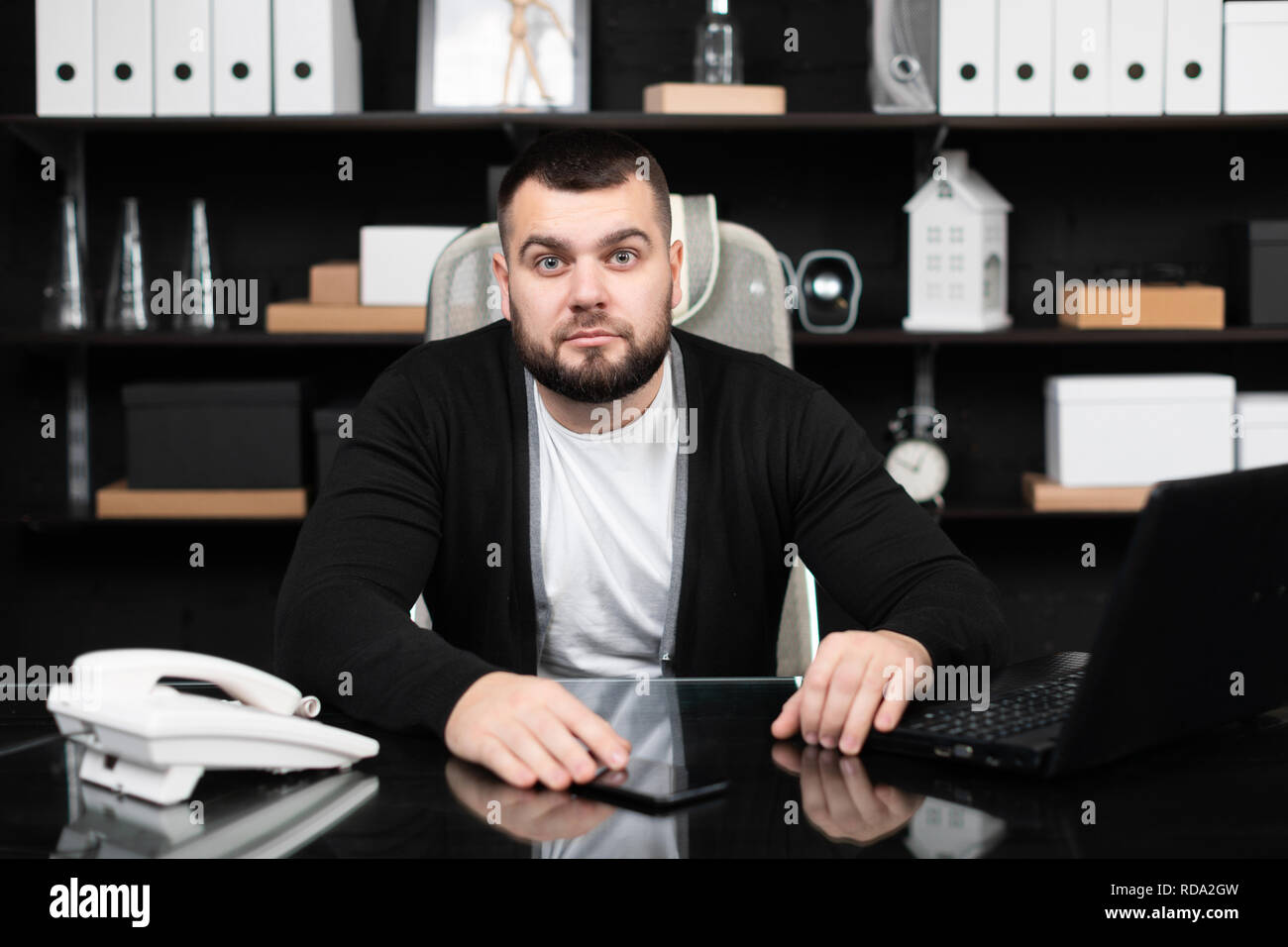 Portrait of man at computer Desk Stock Photo - Alamy