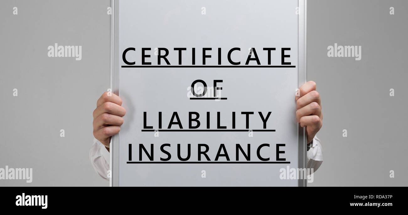 men's hands holding a poster with the inscription certificate of ...