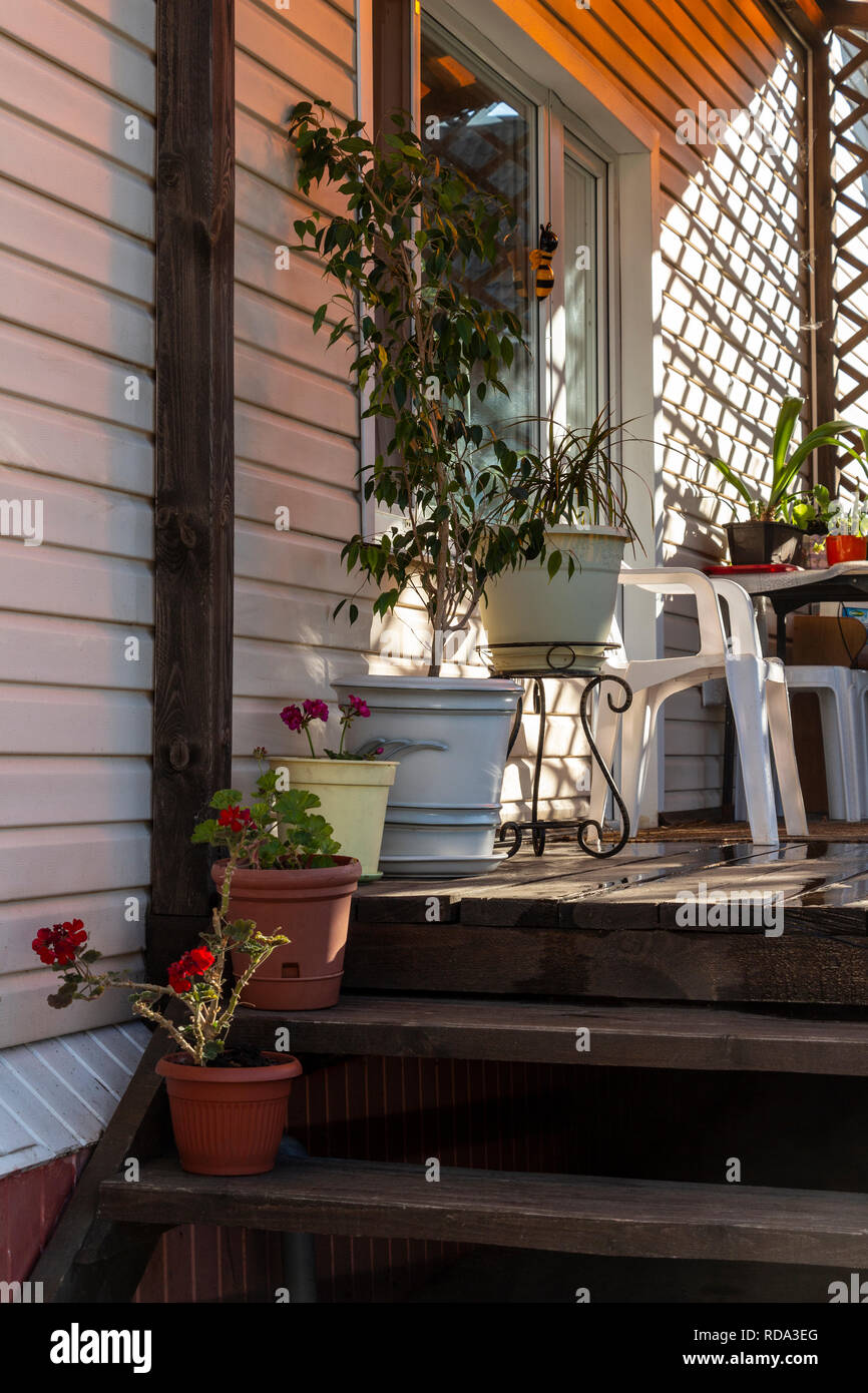 Flowers on the veranda hi-res stock photography and images - Alamy