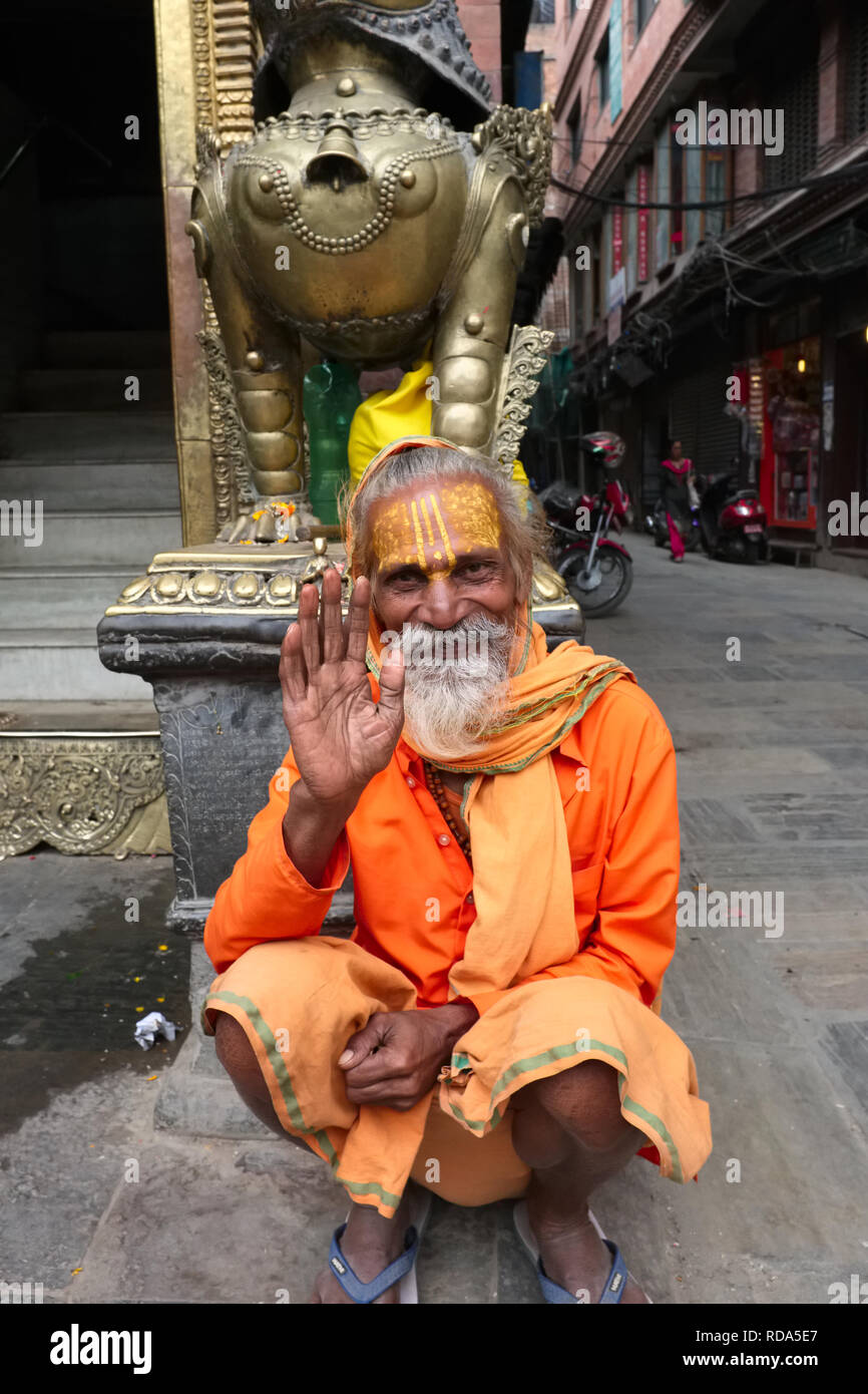 A Sadhu or Hindu holy man or ascetic in Kathmandu, Nepal, sitting in ...