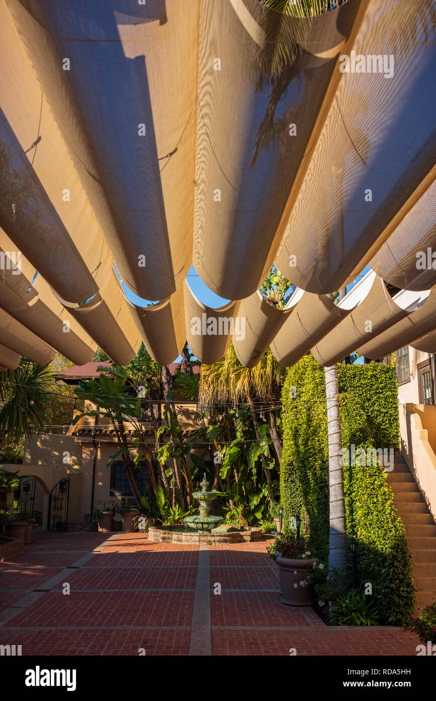 An awning covering an outdoor living space providing shade Stock Photo ...