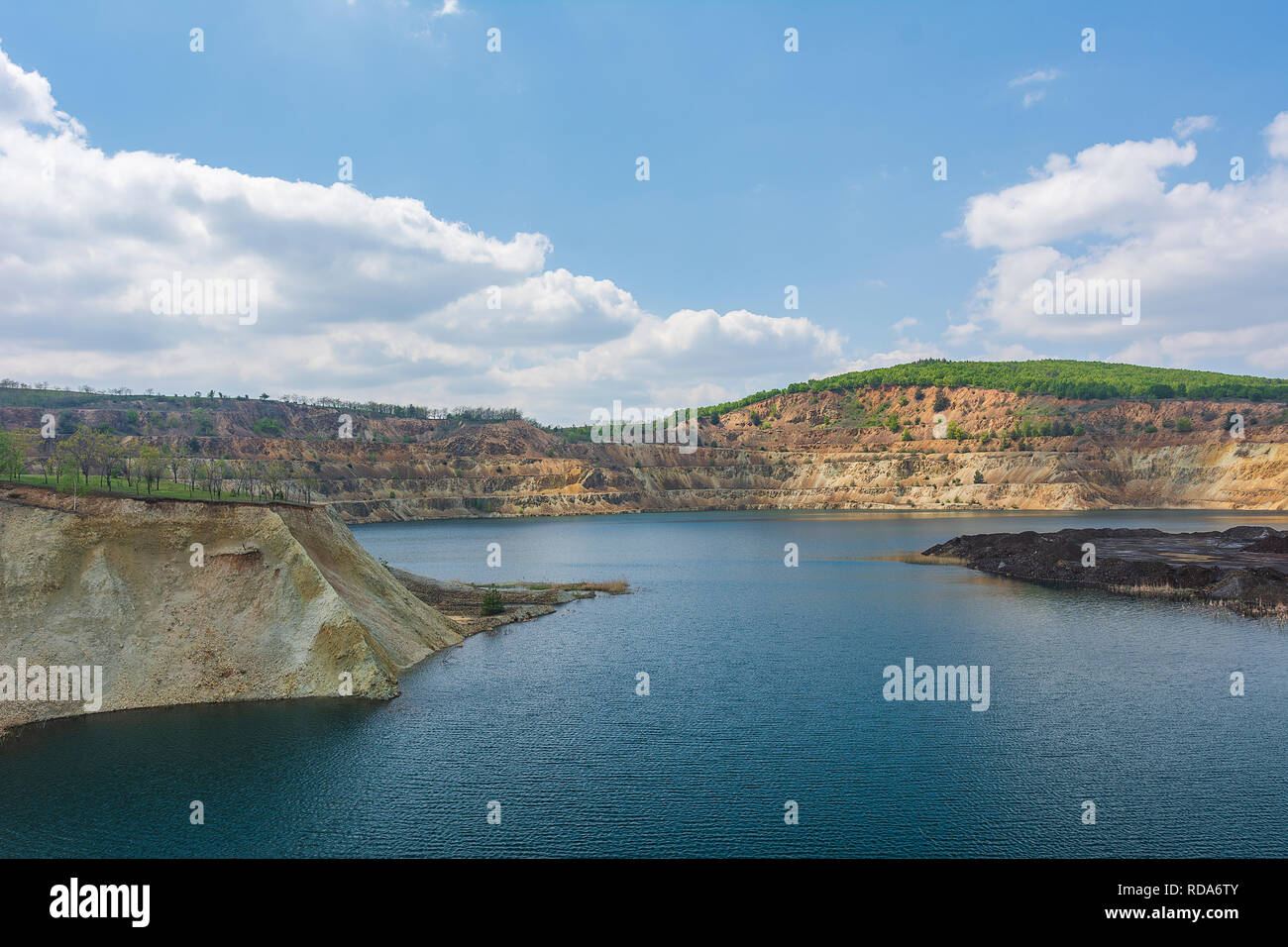 Abandoned cuprum mine in Bulgaria with lake inside Stock Photo - Alamy