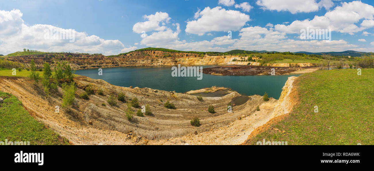 Abandoned cuprum mine in Bulgaria with lake inside Stock Photo - Alamy
