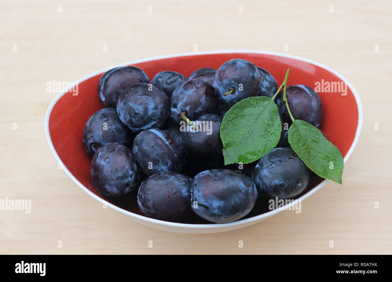 Wet plums hi-res stock photography and images - Alamy