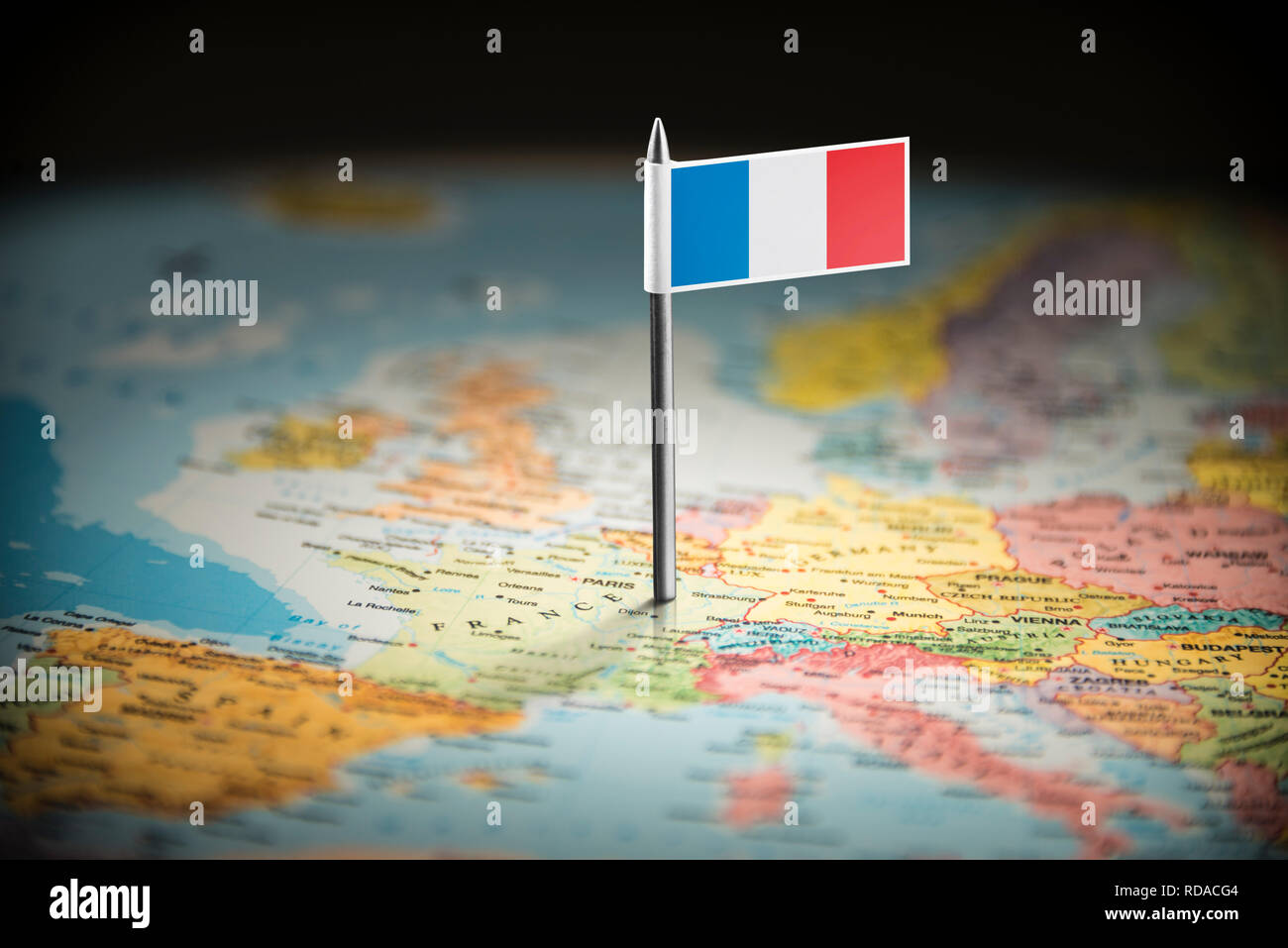 France marked with a flag on the map Stock Photo - Alamy