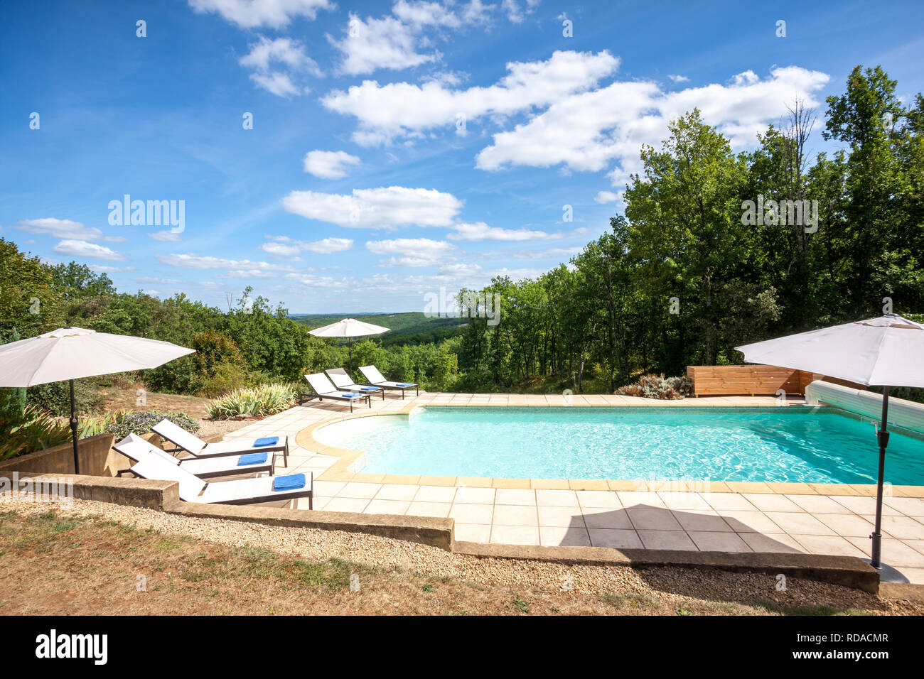Swimming pool in the sunshine in the heart of the French countryside ...