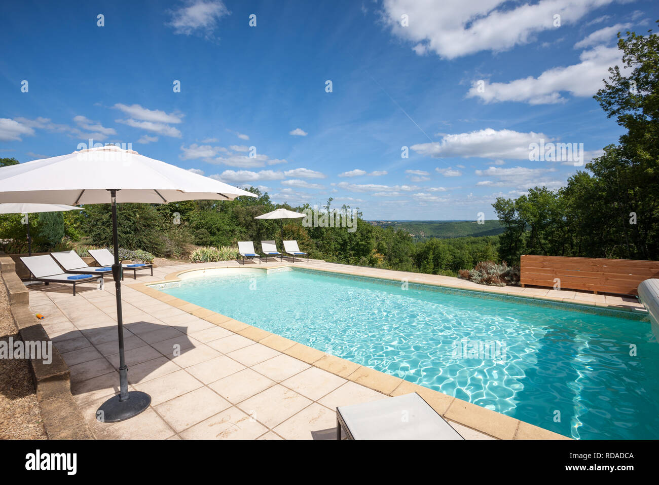 Swimming pool in the sunshine in the heart of the French countryside ...