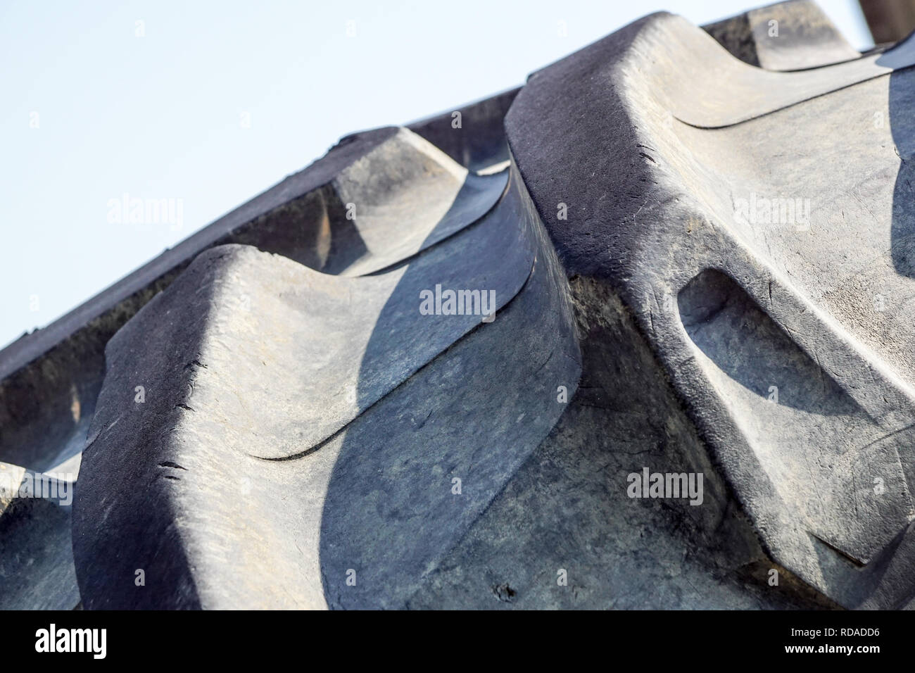 Wide shot of pile of old tractor tires. Close up Stock Photo - Alamy