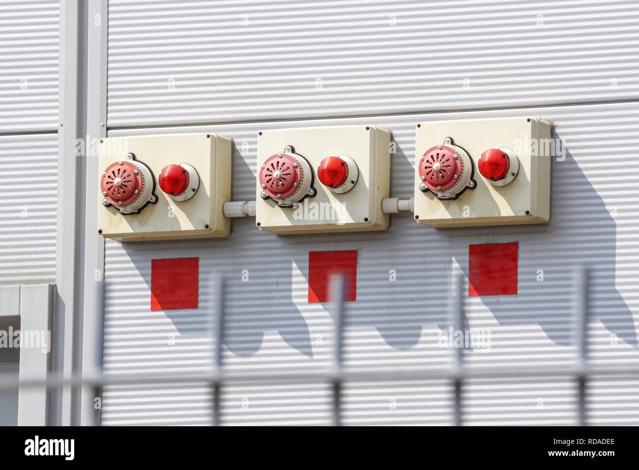 Fire alarm button on the wall .industrial farm Stock Photo - Alamy
