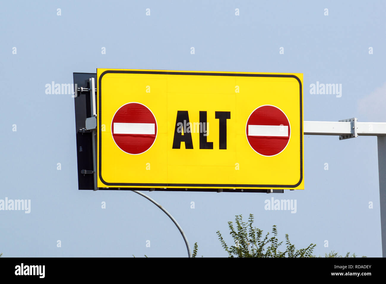 Stop road sign with falling perspective . Alt road sign Stock Photo - Alamy