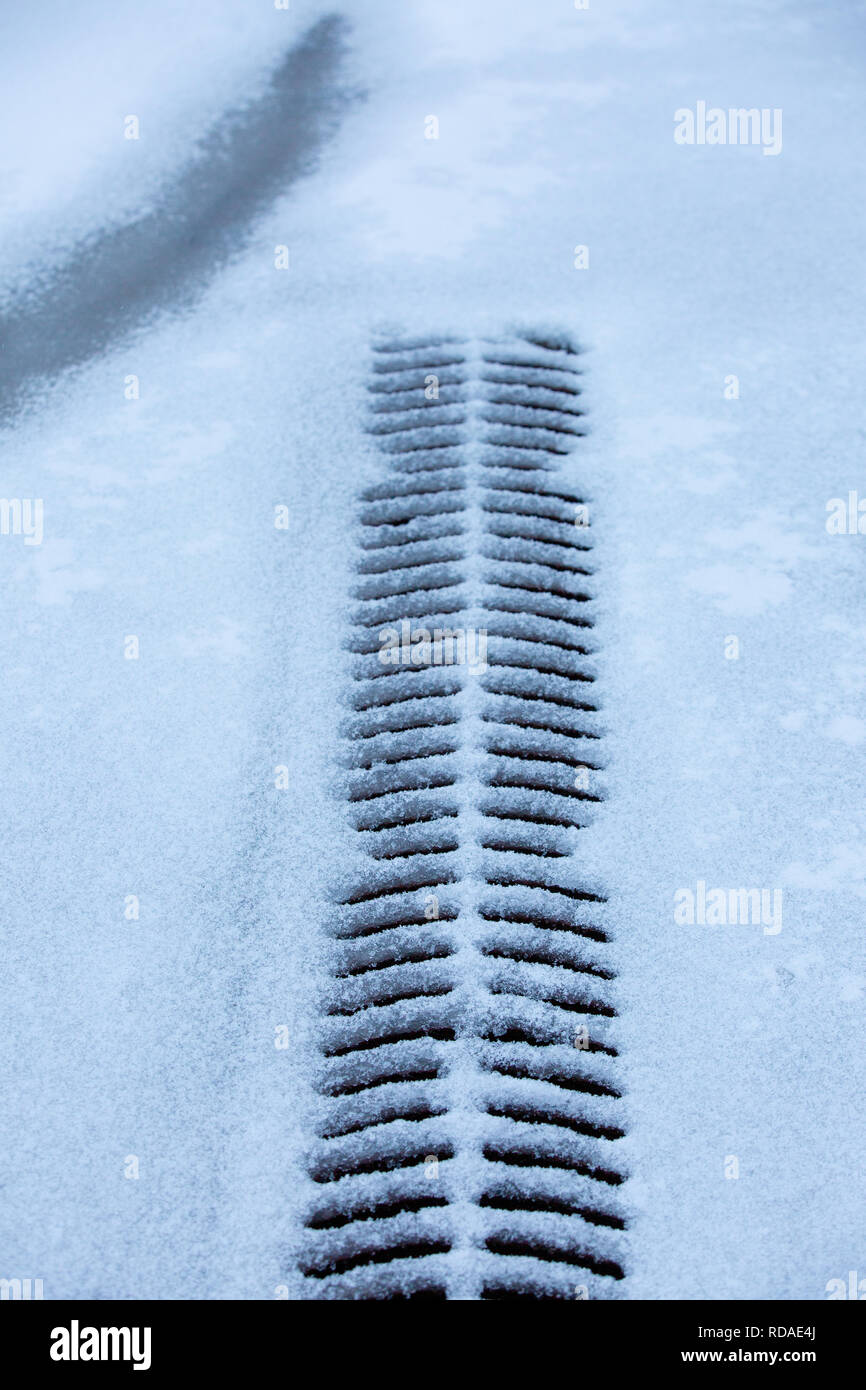 sewer grate powdered by snow Stock Photo - Alamy