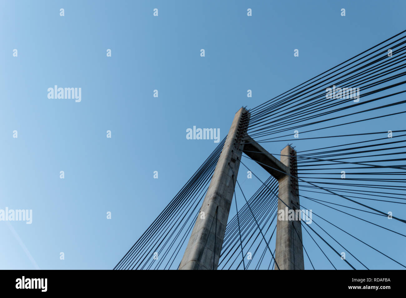 Modern cement bridge pylon structure over clear blue sky Stock Photo ...