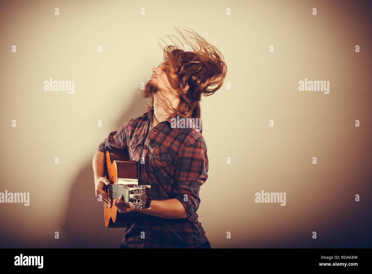 Music hobby passion concept. Enthusiast playing the instrument ...