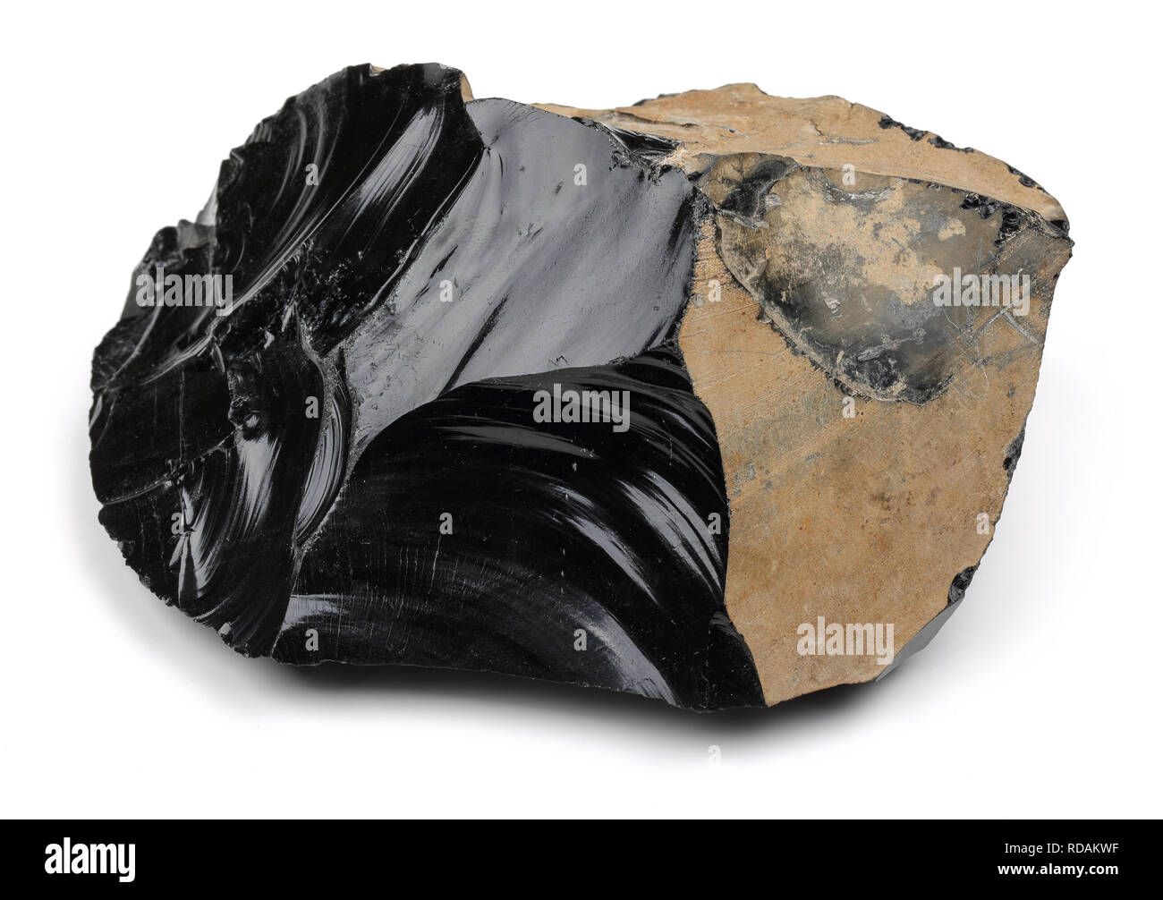 Black obsidian piece isolated on white background Stock Photo - Alamy