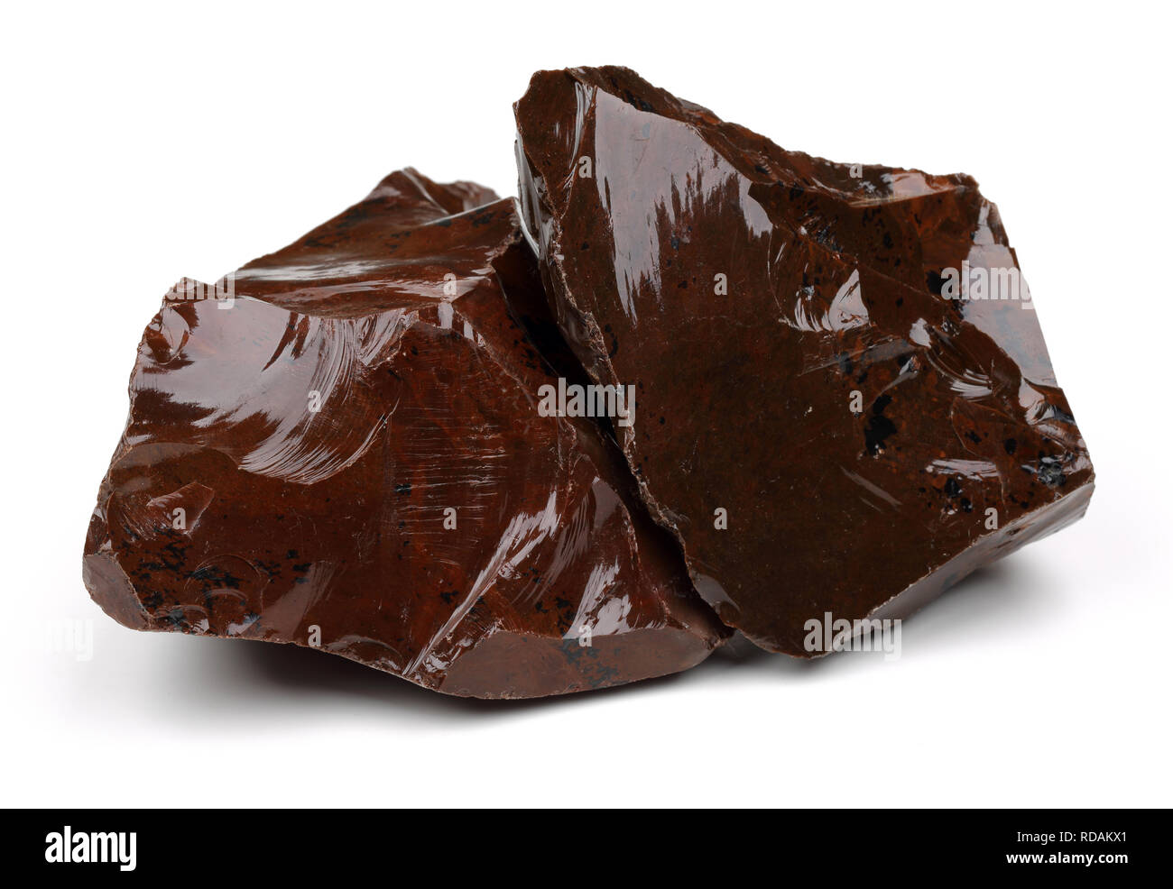 Brown obsidian pieces isolated on white background Stock Photo - Alamy