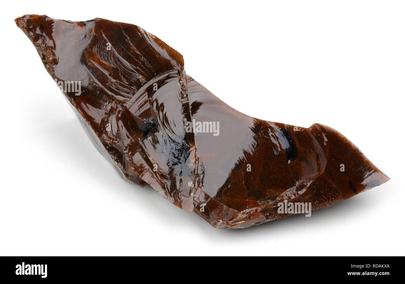 Brown obsidian pieces isolated on white background Stock Photo - Alamy