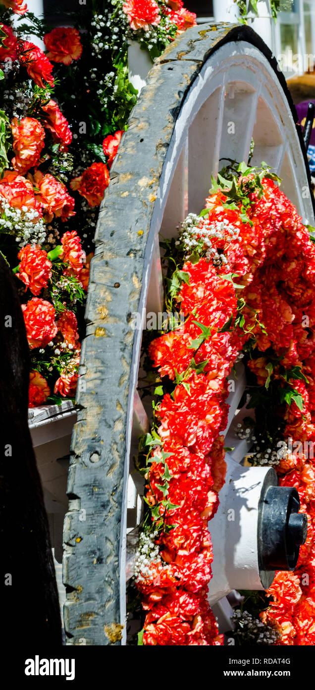 Old rusty circle wheel detail with a wagon, a traditional element of an ...
