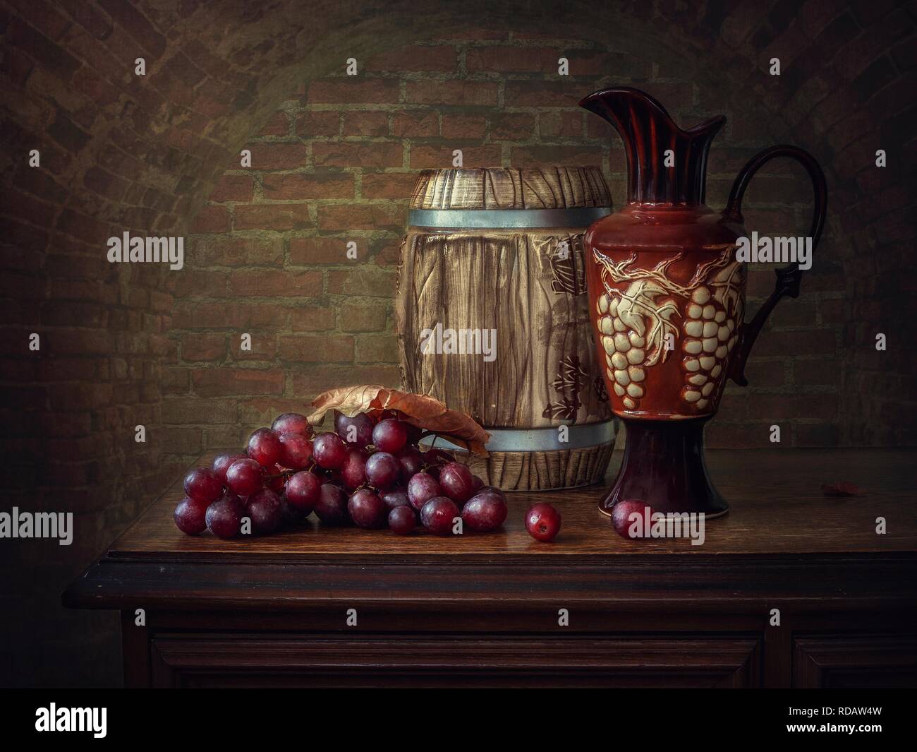 Still life with red grapes Stock Photo - Alamy