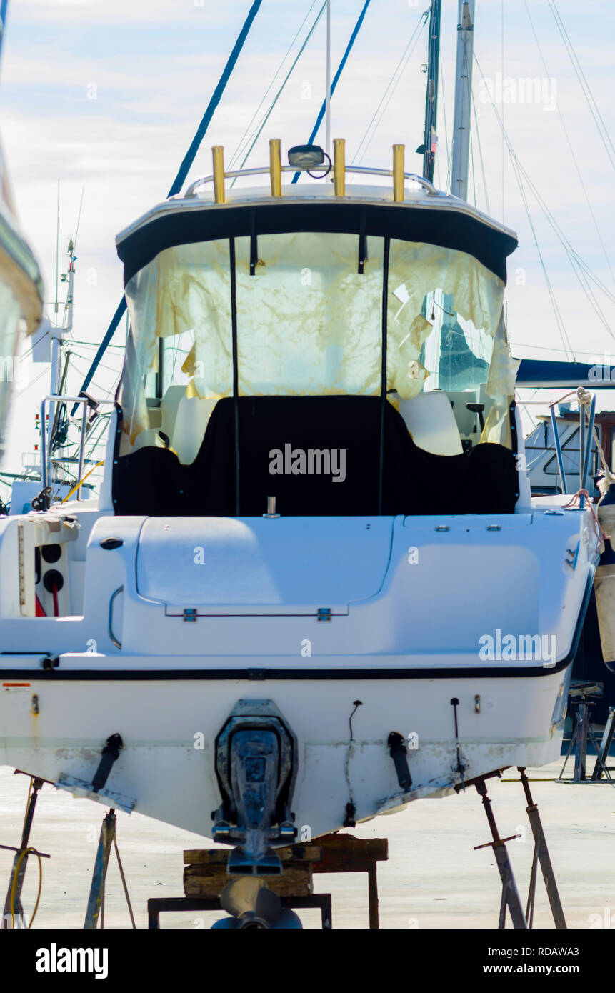 Boat on stand on the shore, close up on the part of the yacht, luxury ...