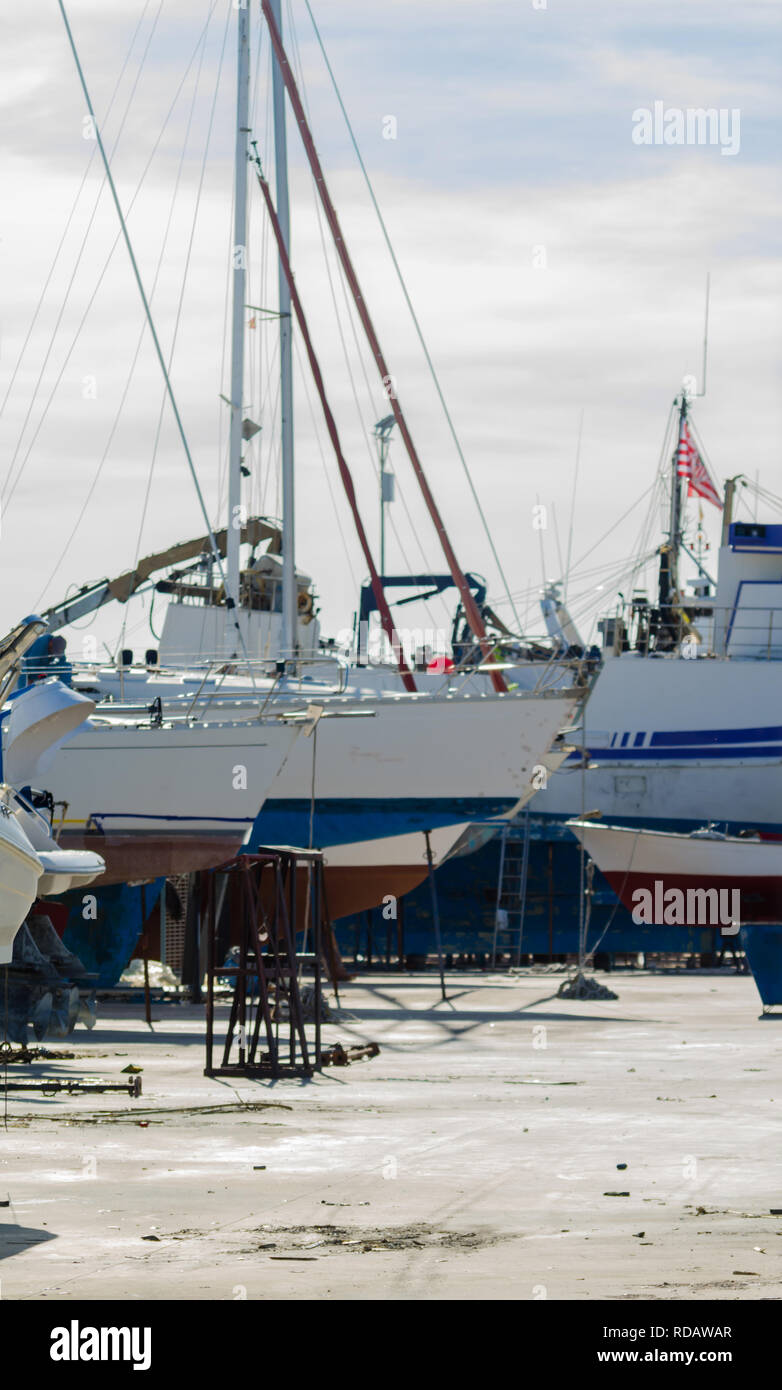 Boat on stand on the shore, close up on the part of the yacht, luxury ...
