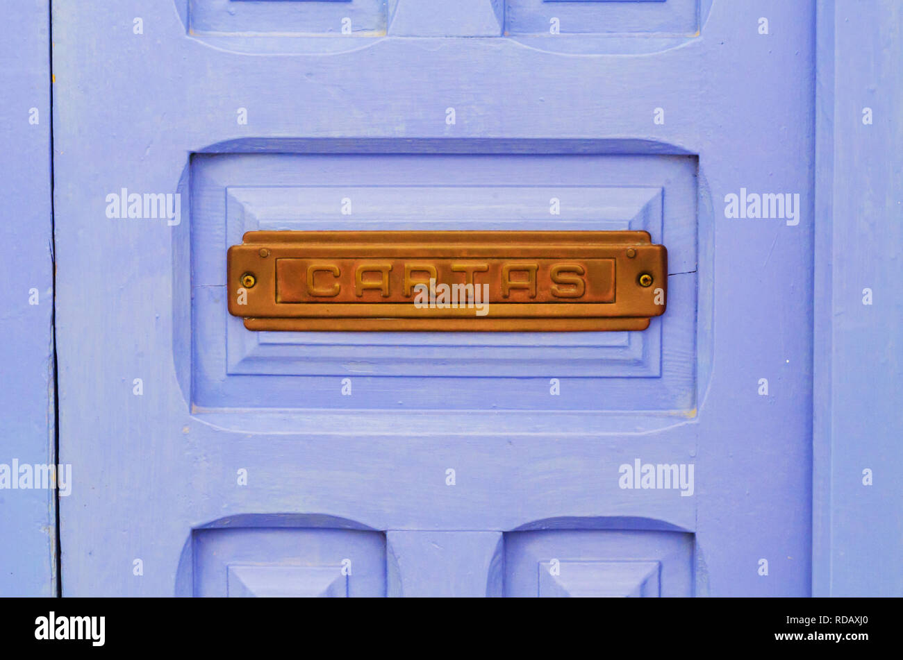 Old letterbox in the wall, traditional way of delivering letters to the ...