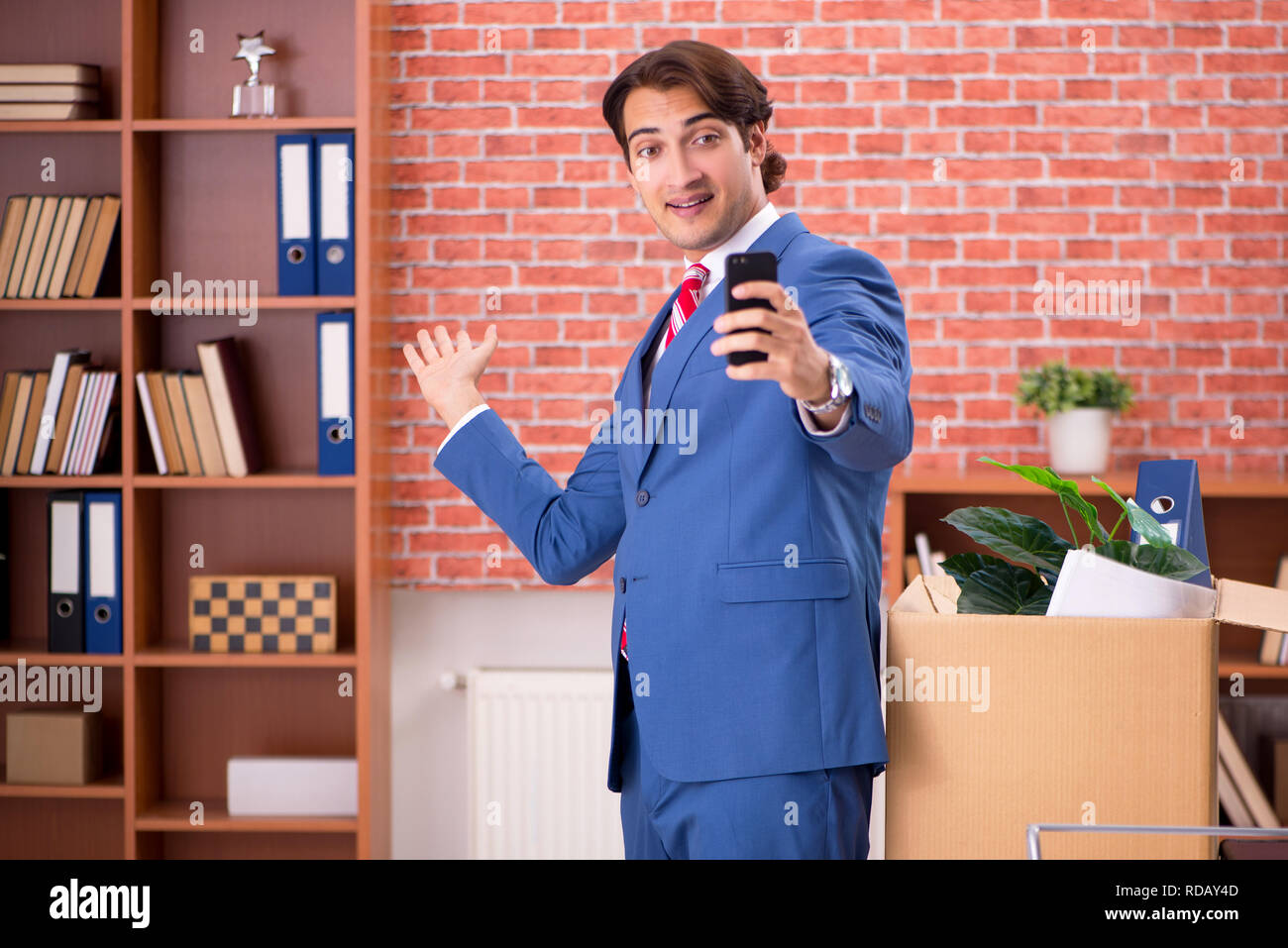 Successful employee getting new job position Stock Photo - Alamy