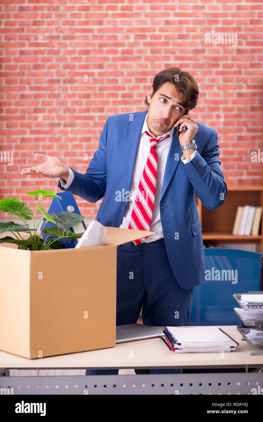 Young person being fired from his work Stock Photo - Alamy