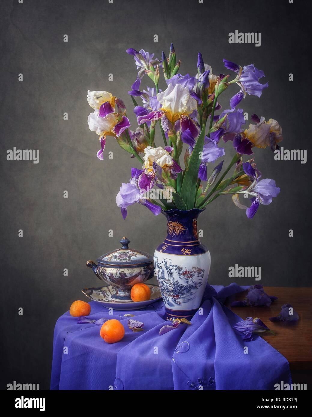 Still life with bouquet of irises Stock Photo - Alamy