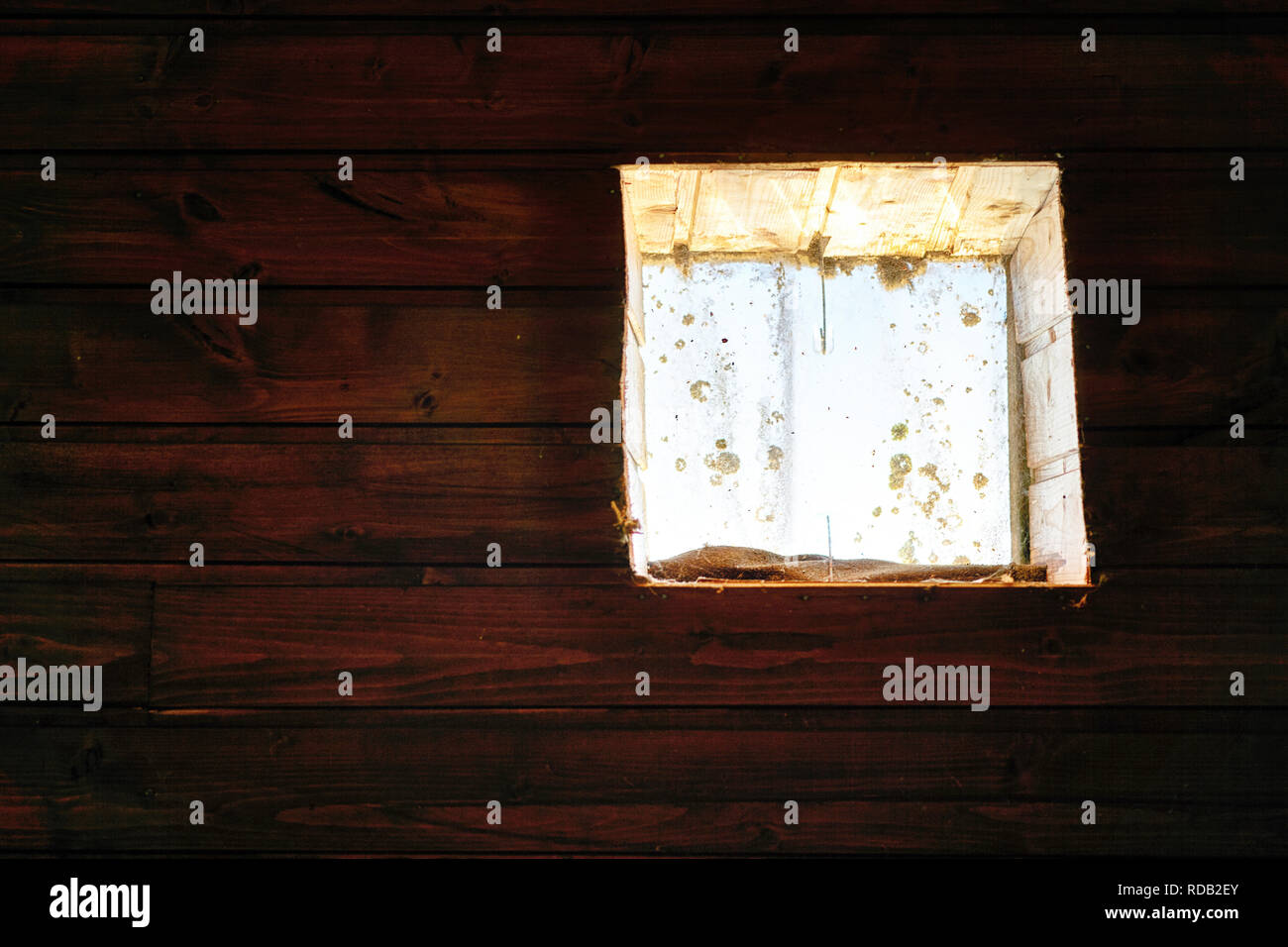 Dark wooden background with bright old window by the light beams Stock ...