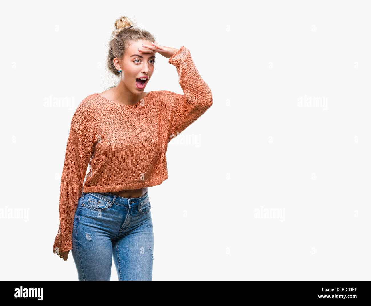 Beautiful young blonde woman over isolated background very happy and ...