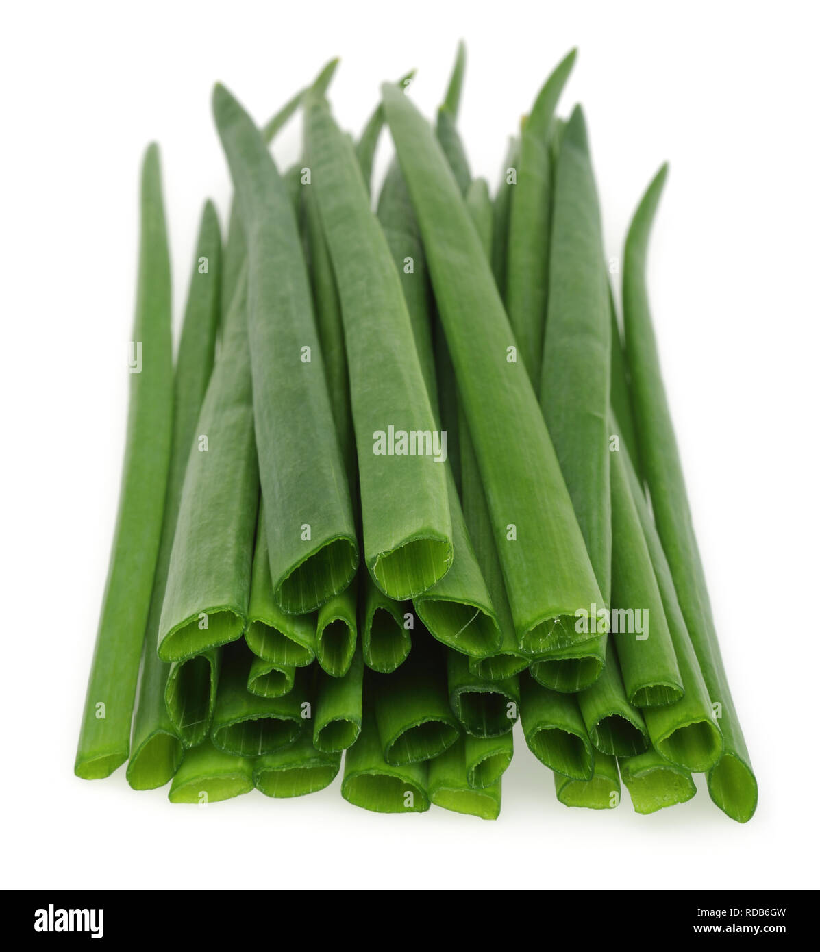 Bunch of fresh spring onion leaves isolated on white background Stock ...