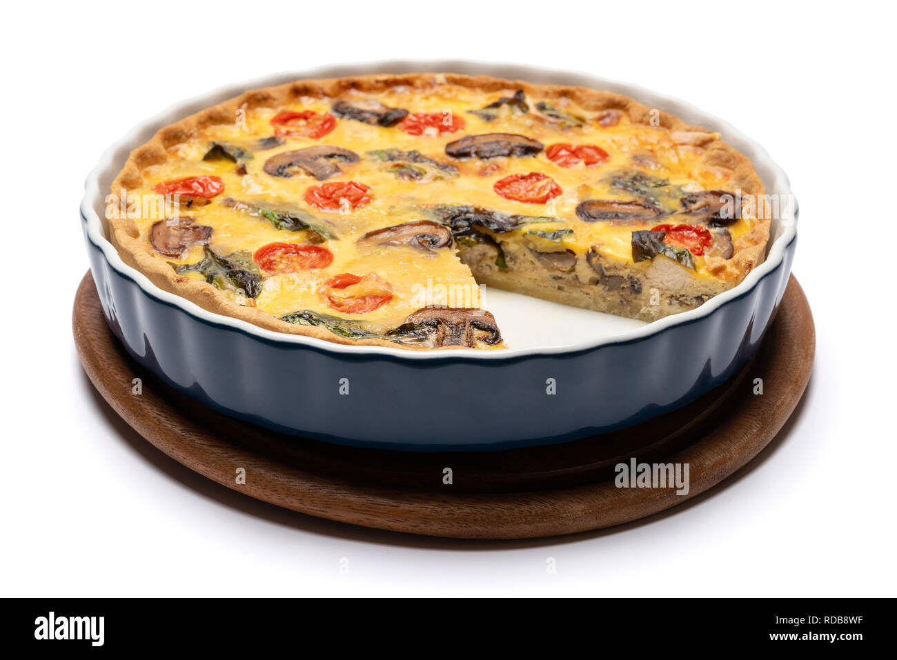 Baked homemade quiche pie in ceramic baking form Stock Photo - Alamy