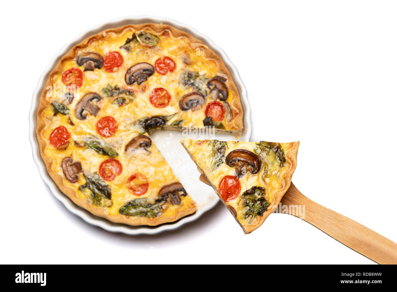 Baked homemade quiche pie in ceramic baking form Stock Photo - Alamy