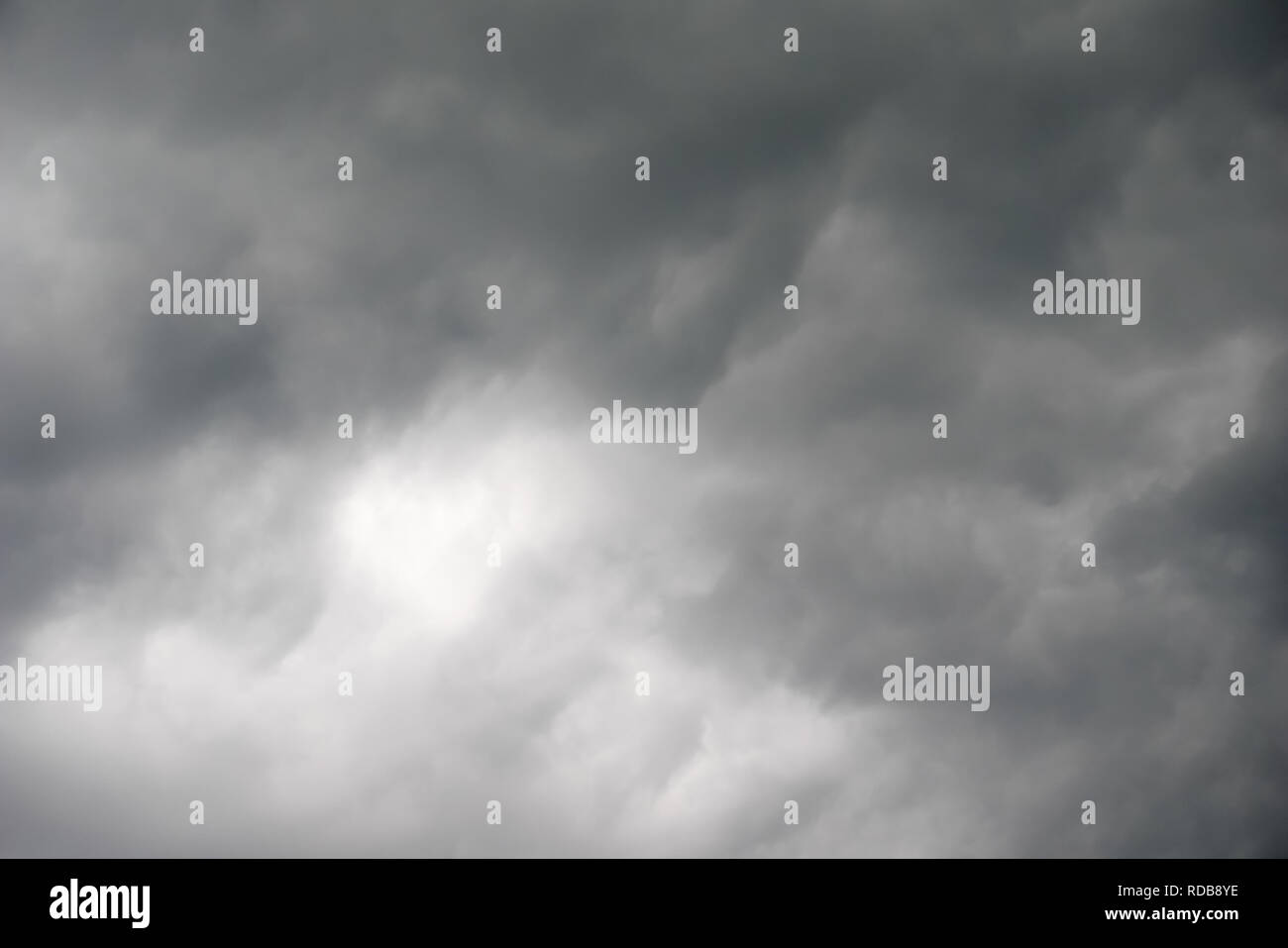 Heavy grey clouds in the sky before the rain - Image Stock Photo - Alamy
