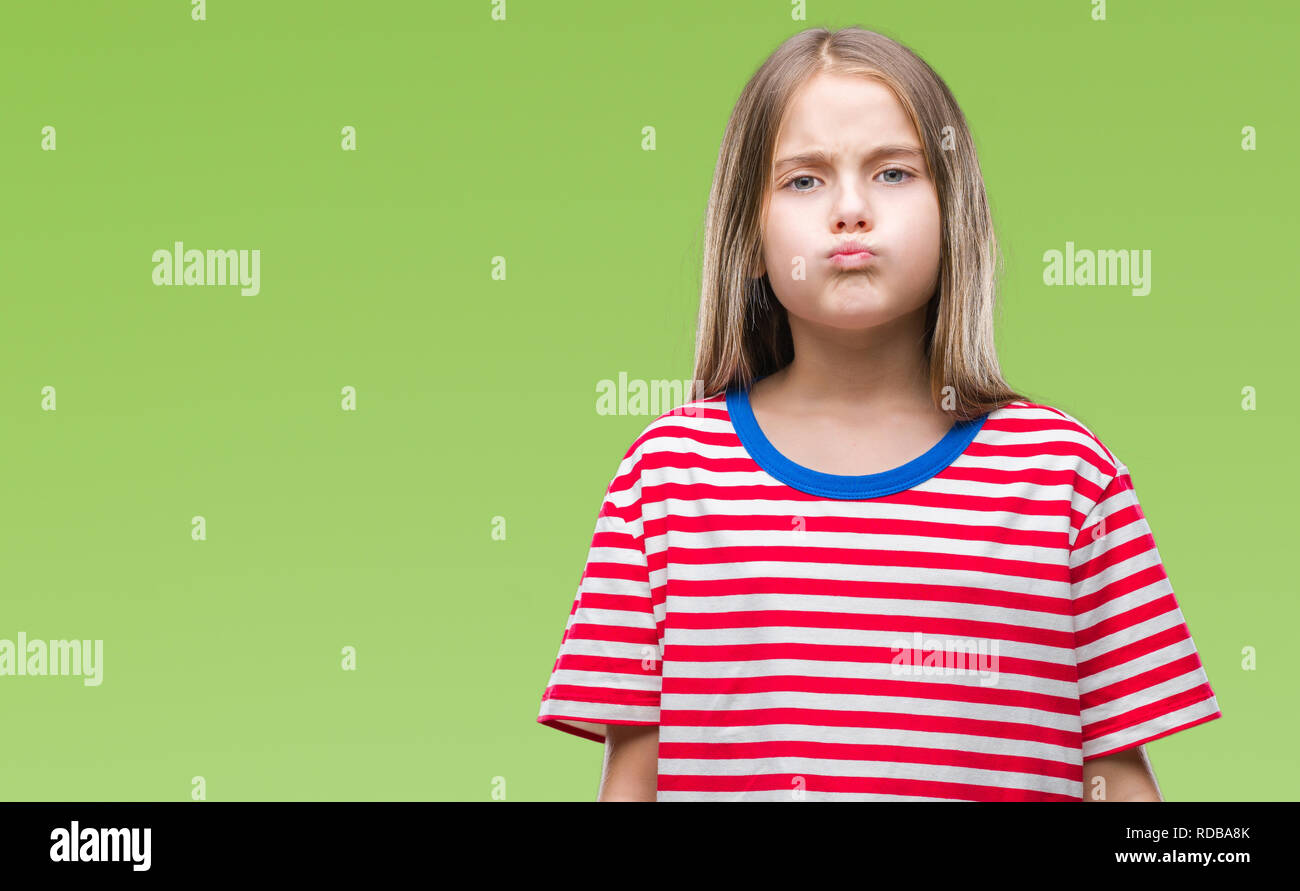 Young beautiful girl over isolated background puffing cheeks with funny ...