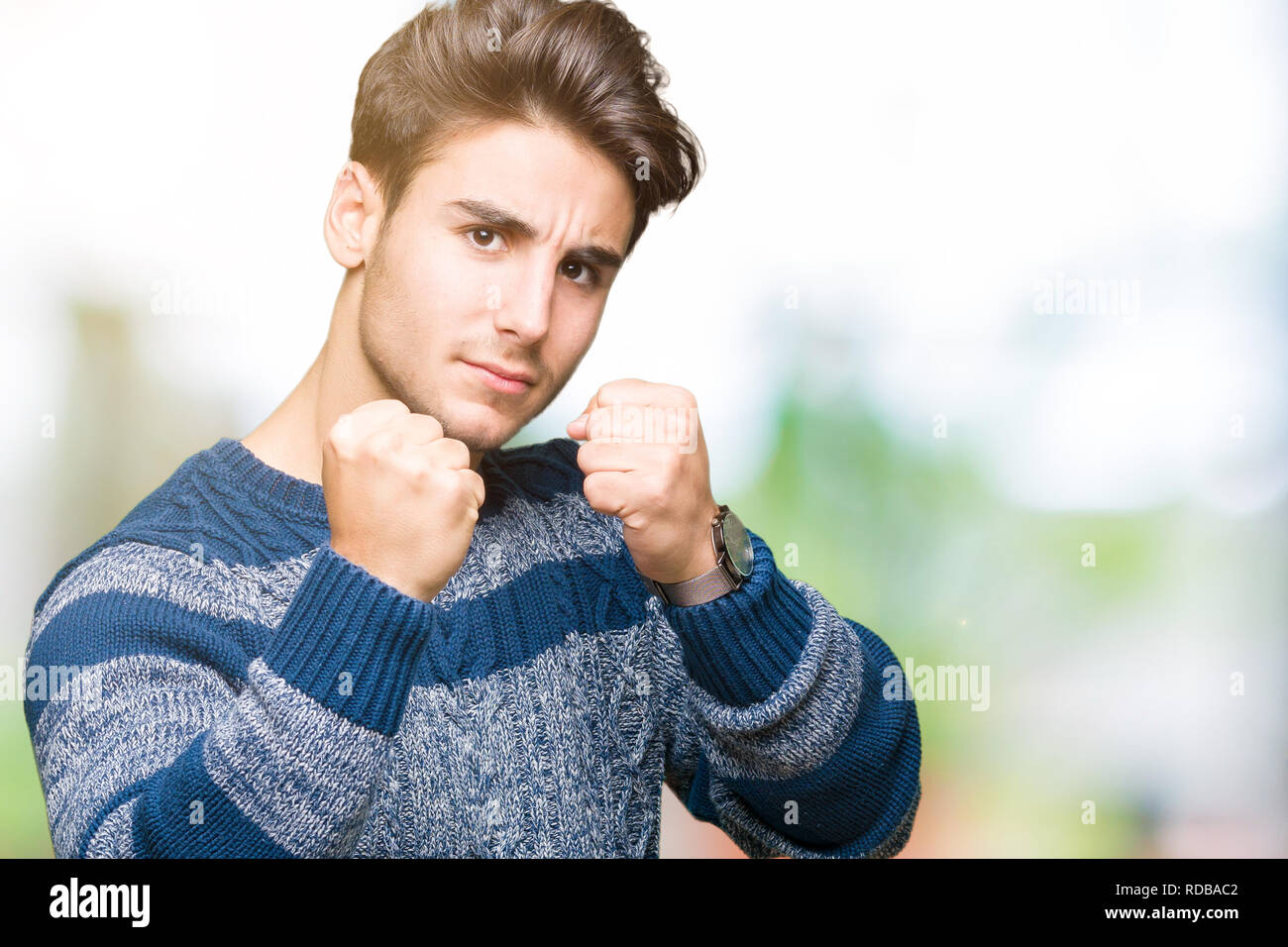 Young man boxing fighting pose hi-res stock photography and images - Alamy
