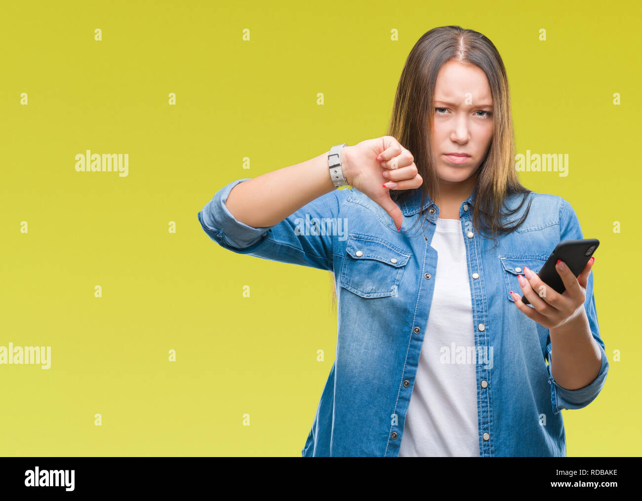 Young beautiful caucasian woman texting sending message using ...