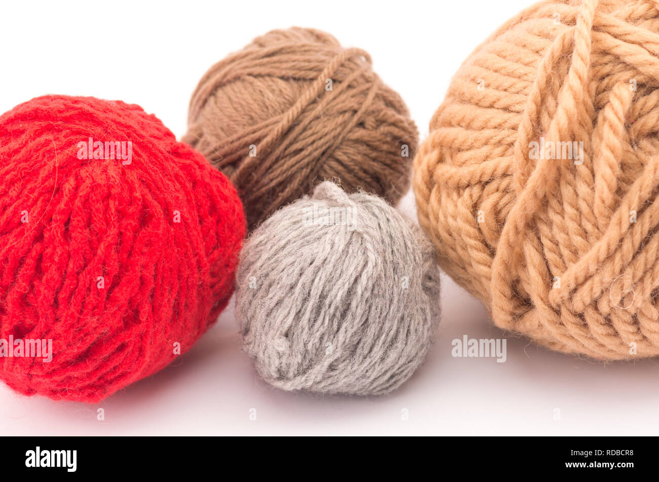 wooll balls still life on a white surface Stock Photo - Alamy
