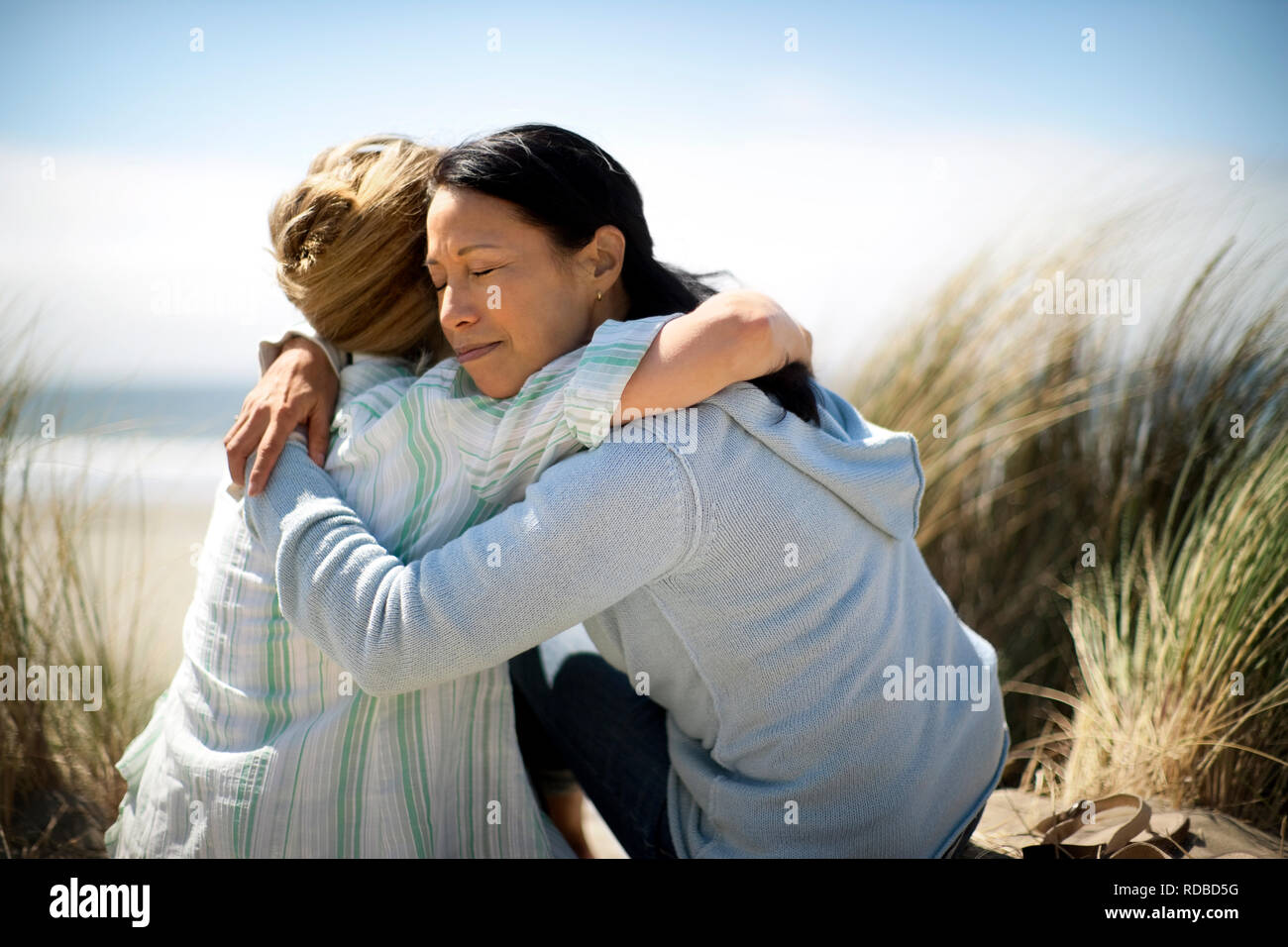 People comforting sandy hi-res stock photography and images - Alamy