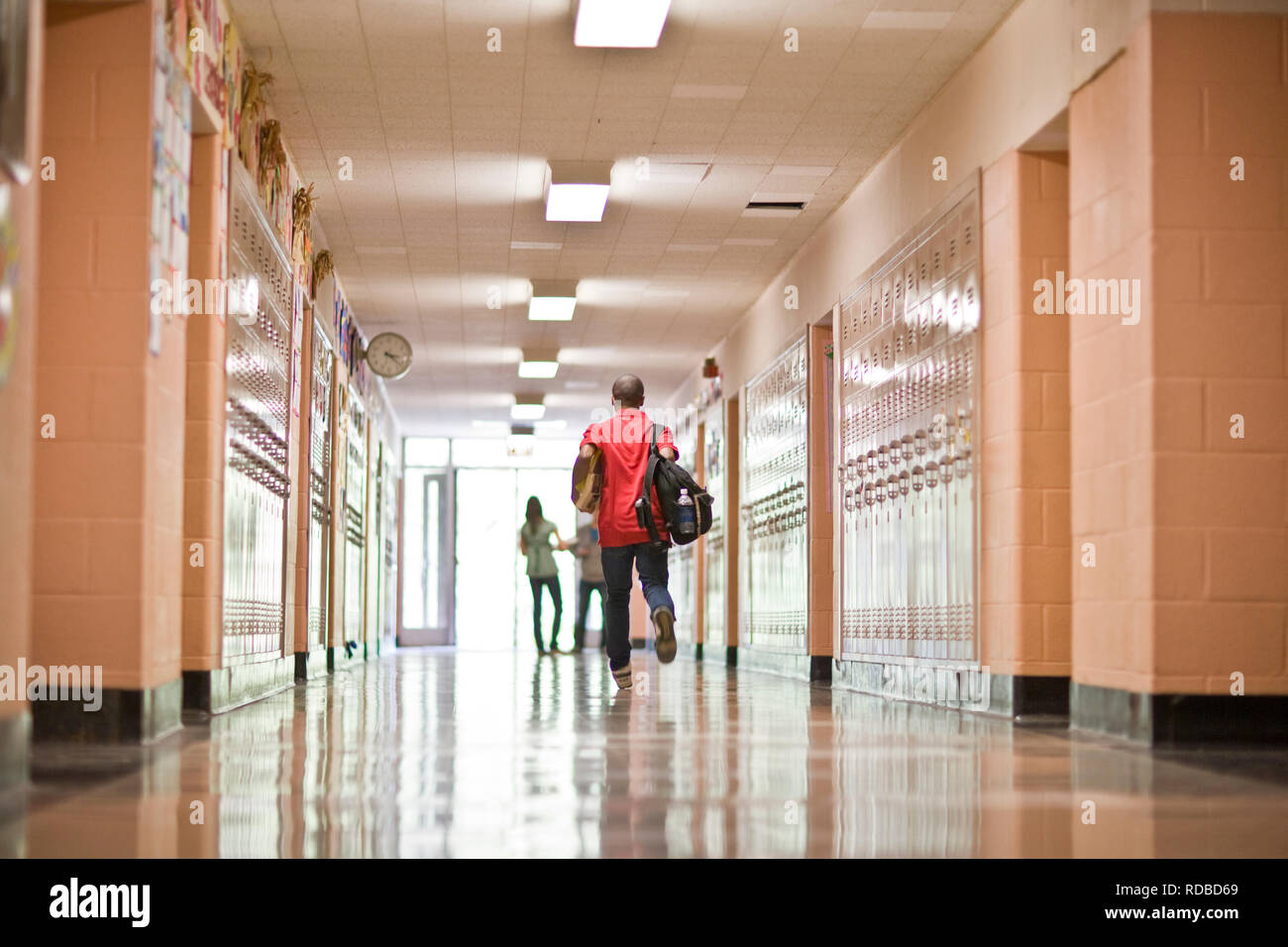 School teenager backpack lockers hi-res stock photography and images ...
