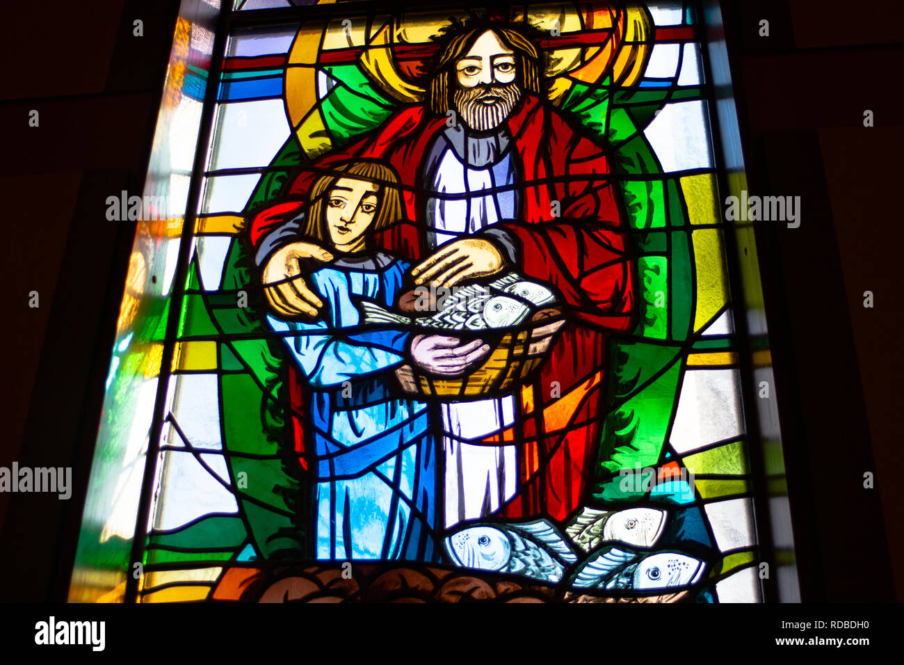 Light shining through stained glass windows hi-res stock photography ...