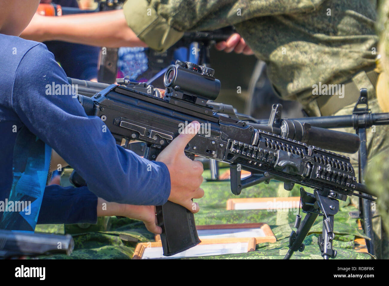 The hands of a hunter holding a rifle hi-res stock photography and ...