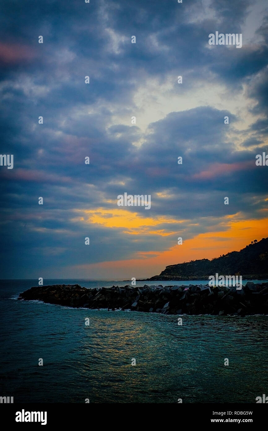 dramatic sunset on the basque coast Stock Photo - Alamy