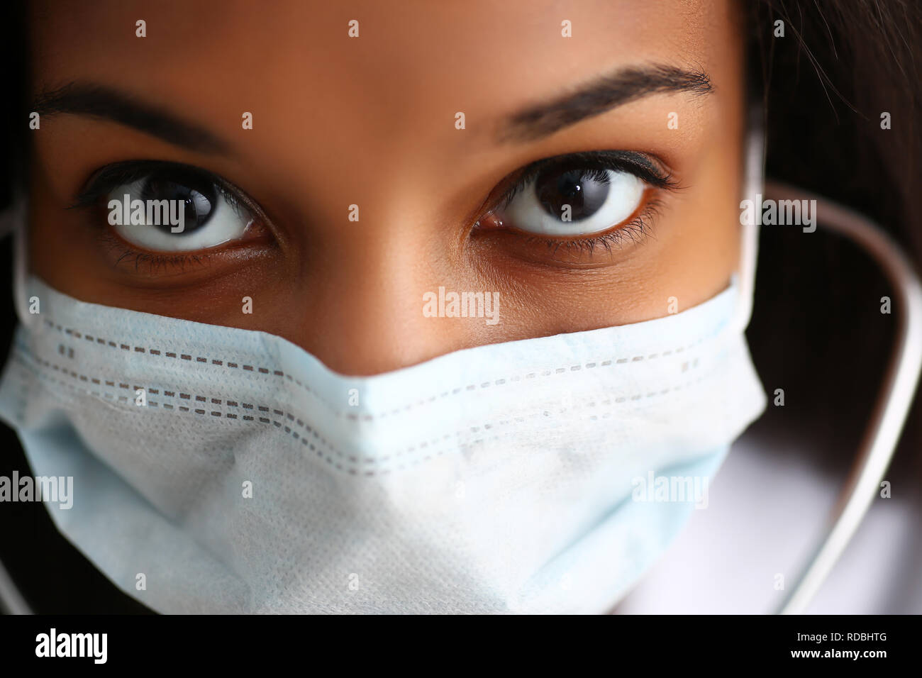Black female doctor in a face mask Stock Photo - Alamy