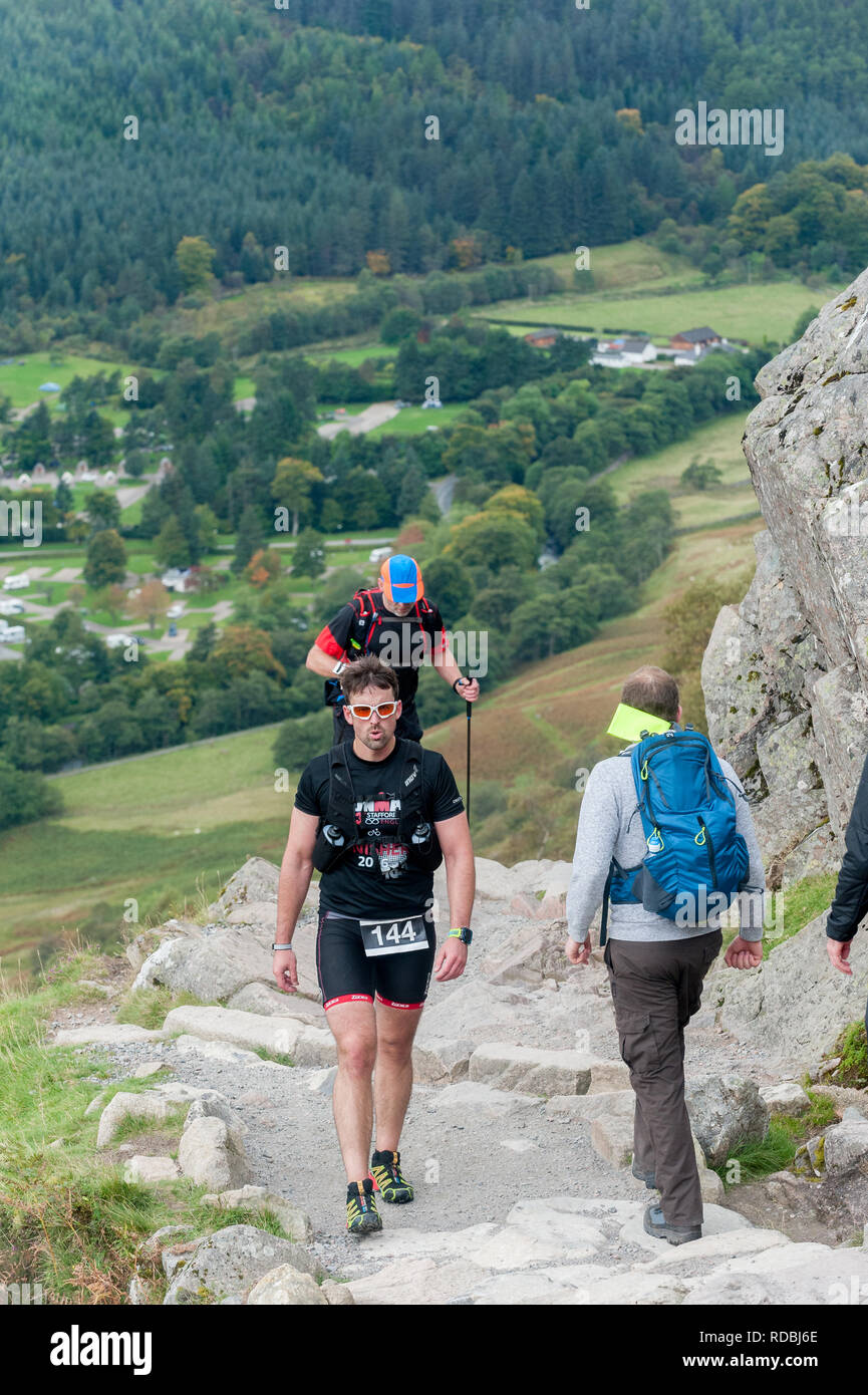 Male walking up Ben Nevis path during triathlon ,glen Nevis Lochaber ...