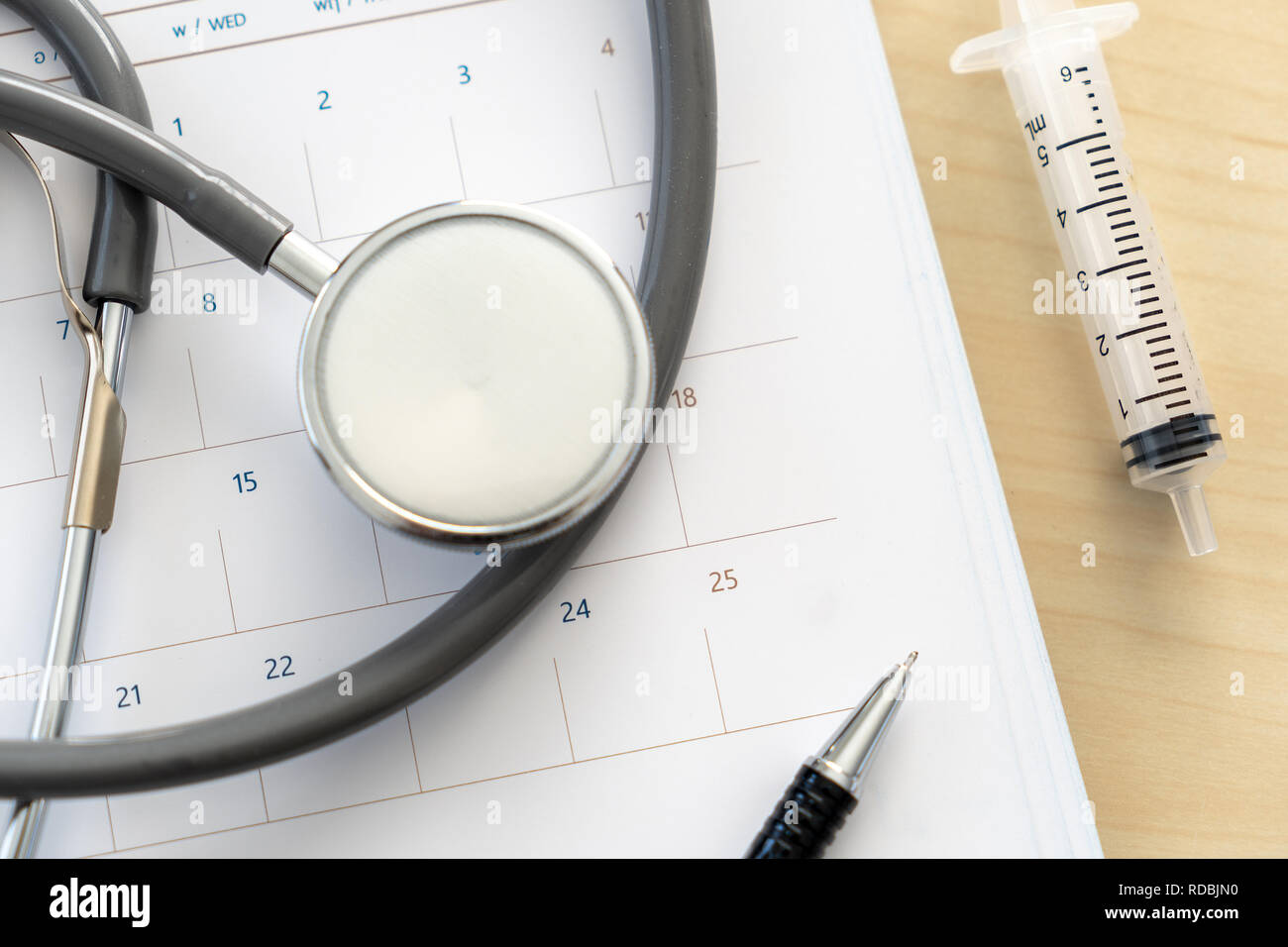 Medical appointment book in the calendar stethoscope and calendar ...