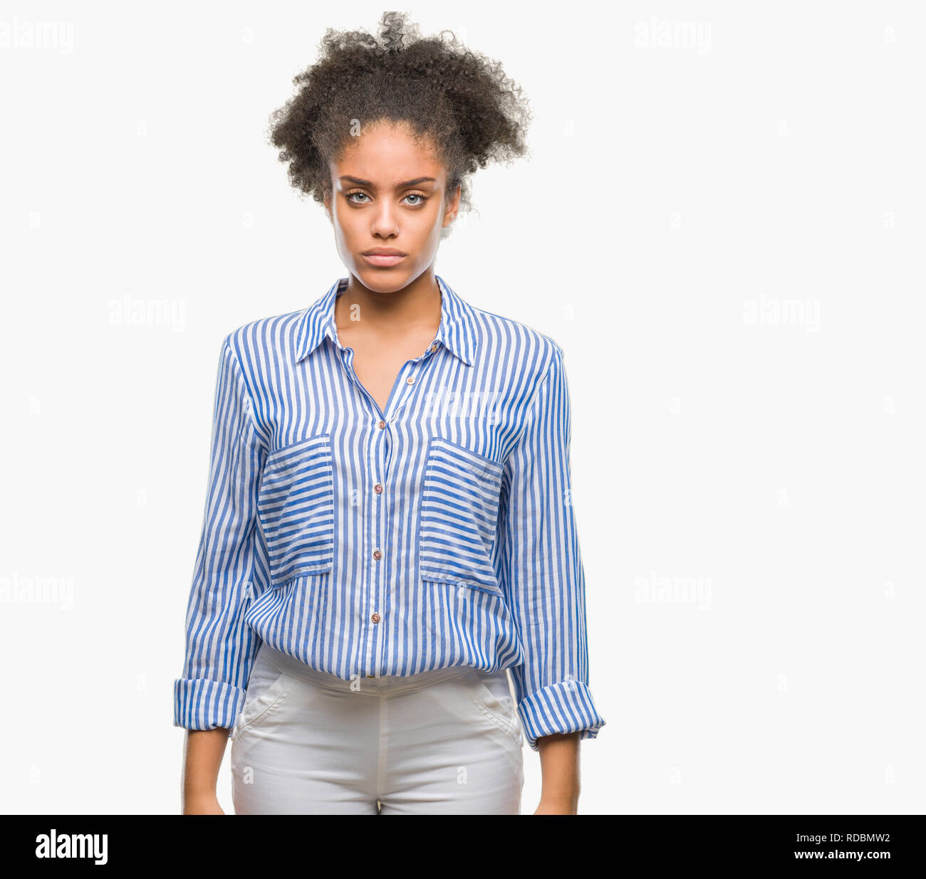 Young afro american woman over isolated background depressed and worry ...