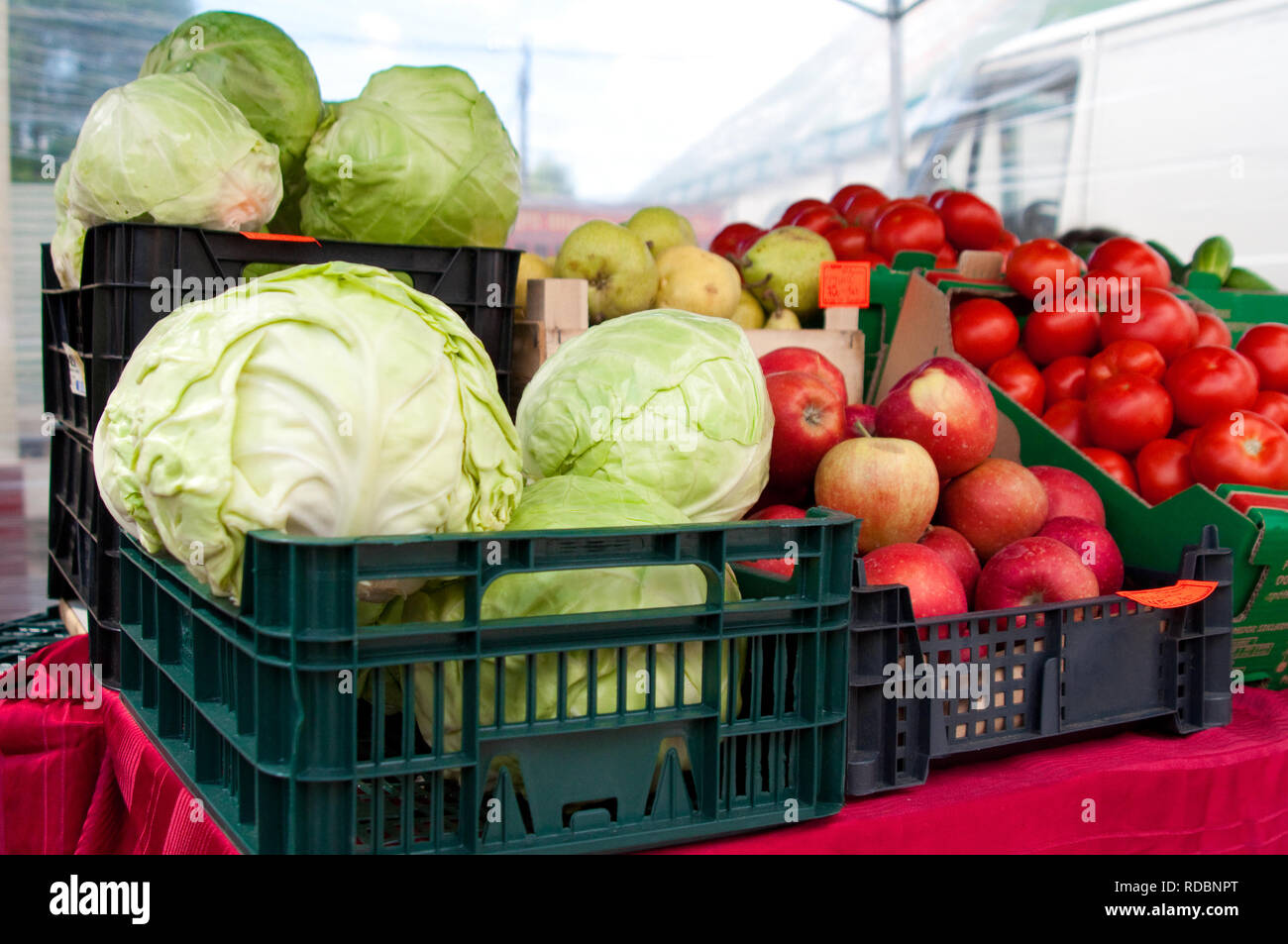 High resolution image. Vegetables on sale. Cabbage, tomatoes, apples ...