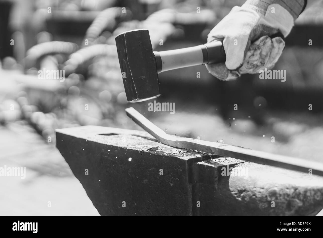 Manual Pounding Black and White Stock Photos & Images - Alamy